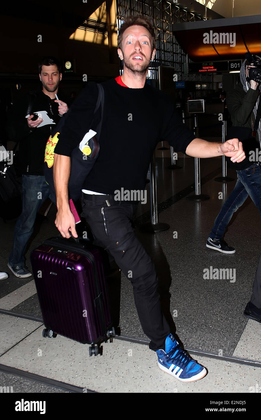 Coldplay frontman in good spirits as he arrives at LAX airport ...