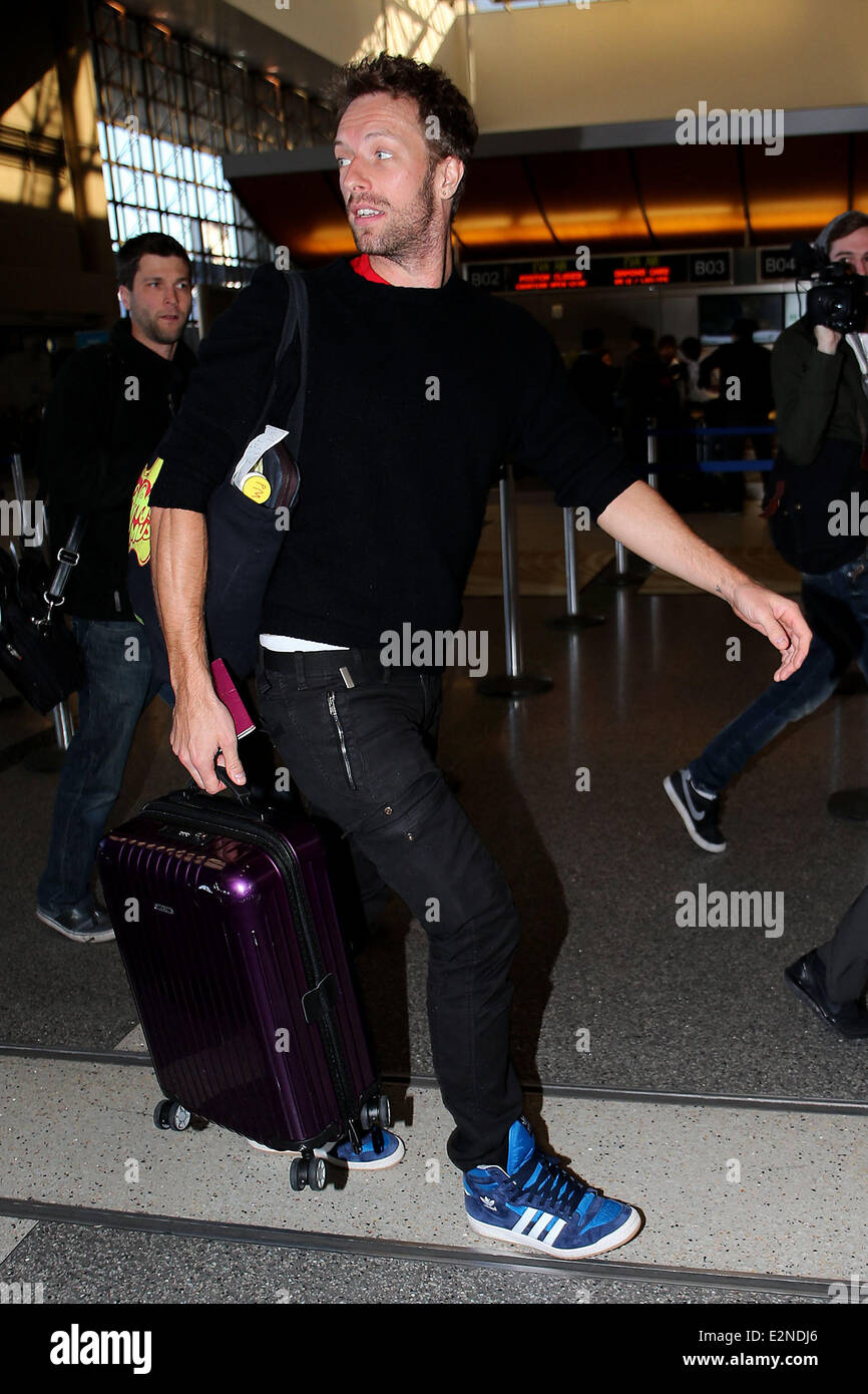 Coldplay frontman in good spirits as he arrives at LAX airport ...