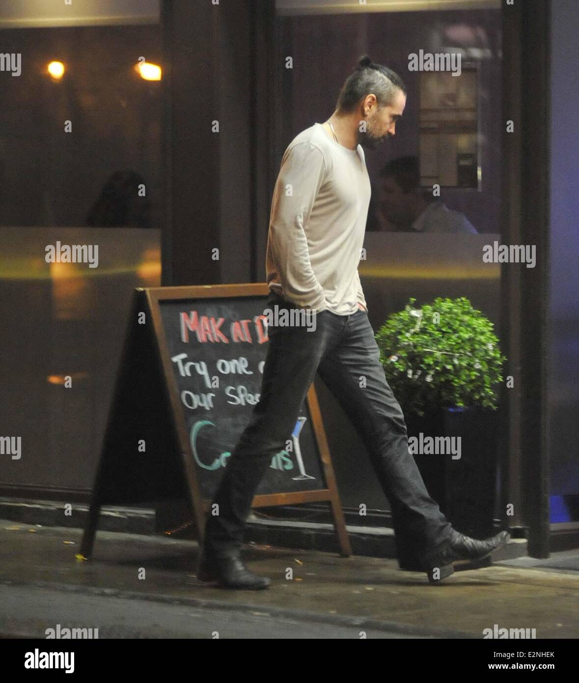 Colin Farrell looking disheveled and sporting a full beard is seen ...