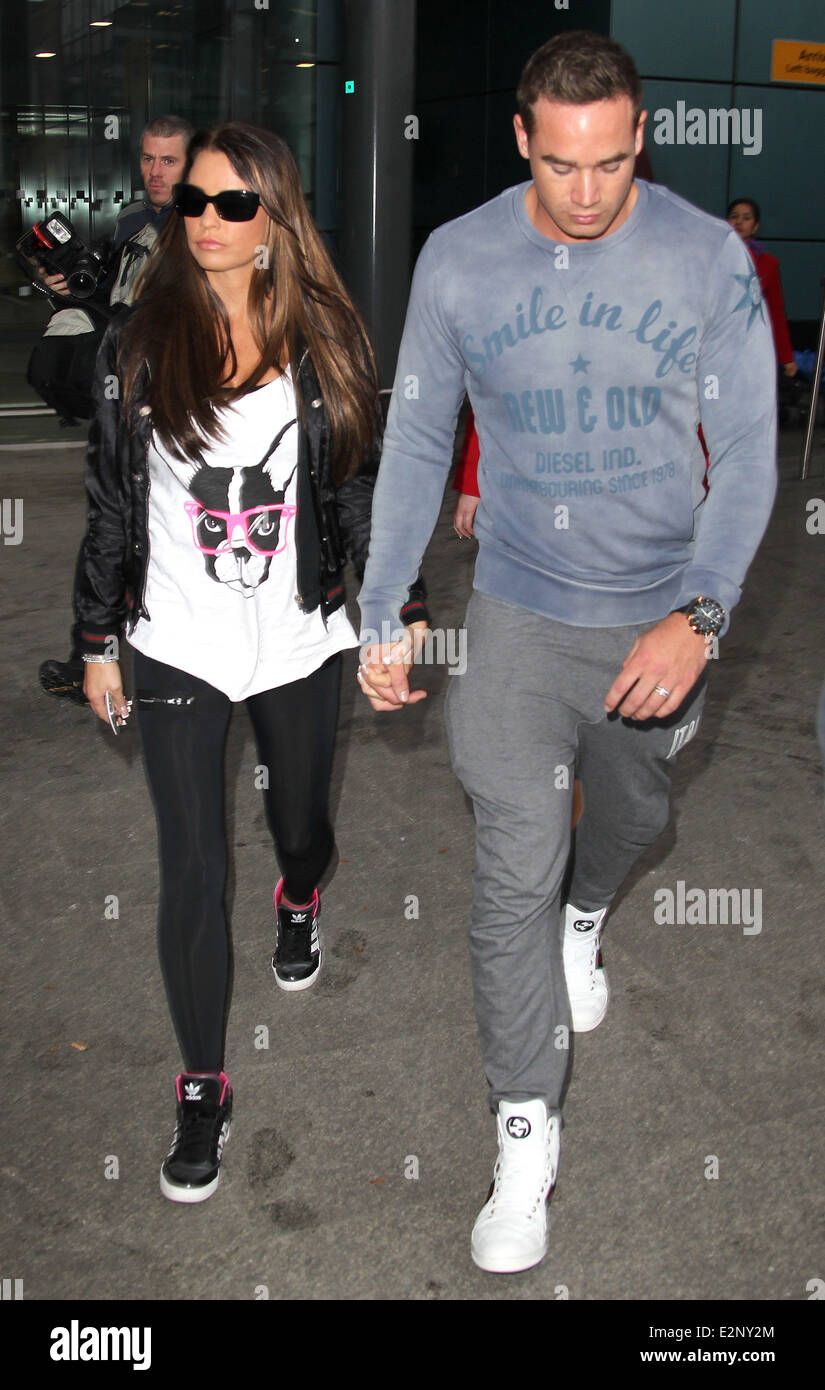Katie Price and new husband Kieran Hayler arrive at Heathrow airport ...