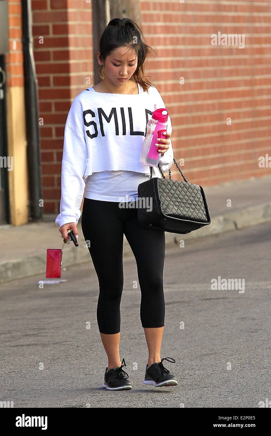 Brenda Song leaves her gym in Studio City wearing a sweatshirt that ...