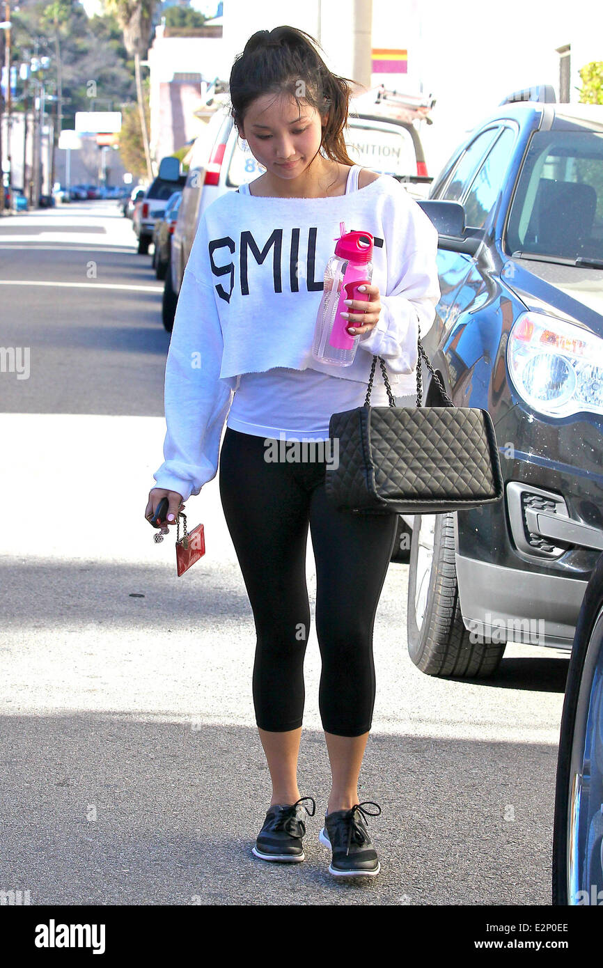 Brenda Song leaves her gym in Studio City wearing a sweatshirt that ...