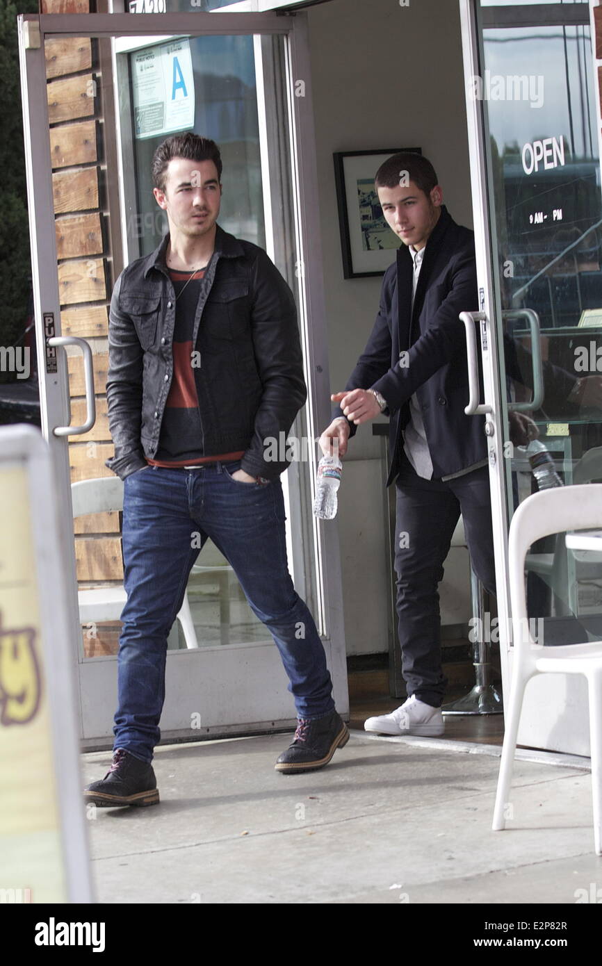 The Jonas brothers head to Guitar center on Sunset Boulevard Featuring ...