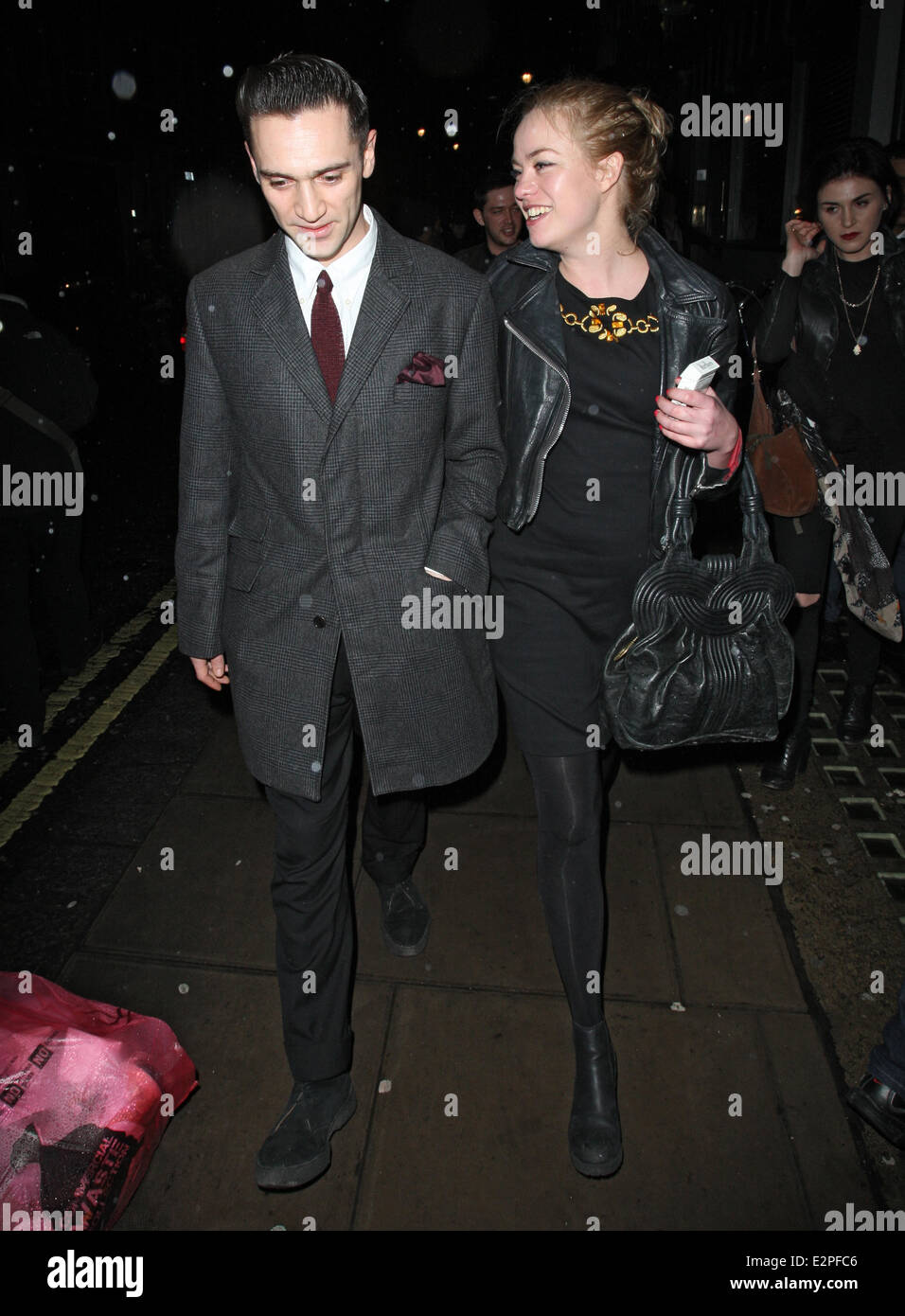 Reg Traviss leaves the Groucho club with a female companion Featuring ...