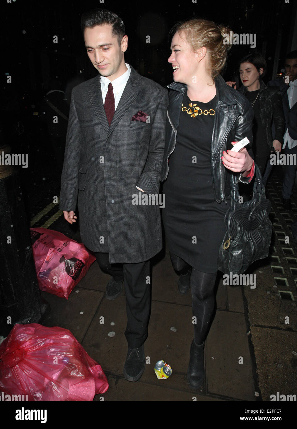 Reg Traviss leaves the Groucho club with a female companion Featuring ...