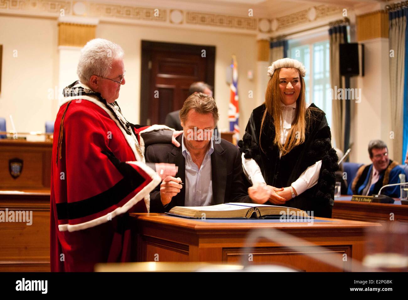 Liam Neeson signs the freedom of Ballymena acceptance at Braid Centre ...