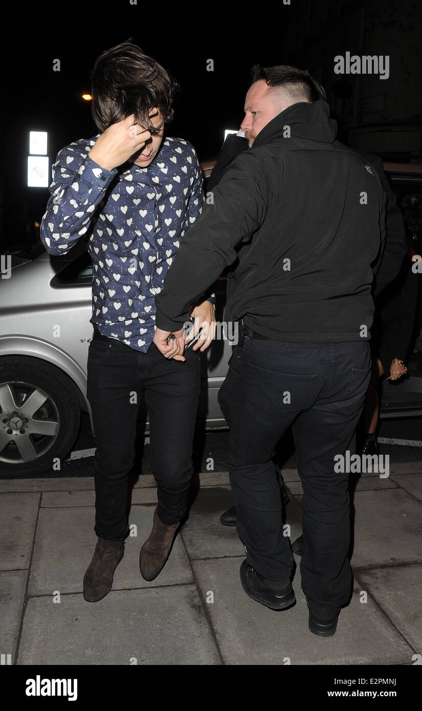 Harry styles appears rather unsteady on his feet hi-res stock ...