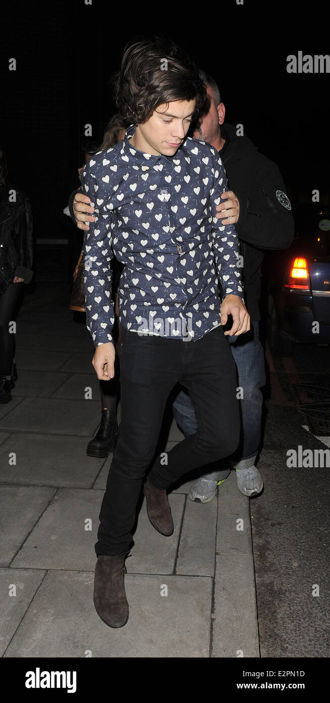 Harry styles appears rather unsteady on his feet hi-res stock ...