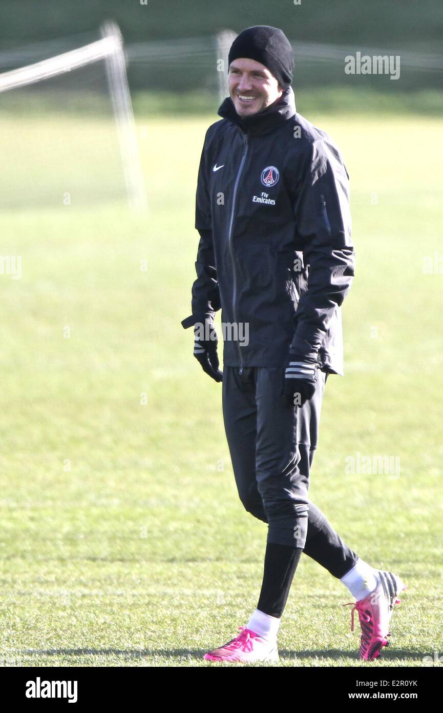 David Beckham appears in good spirits as he trains in pink Adidas ...