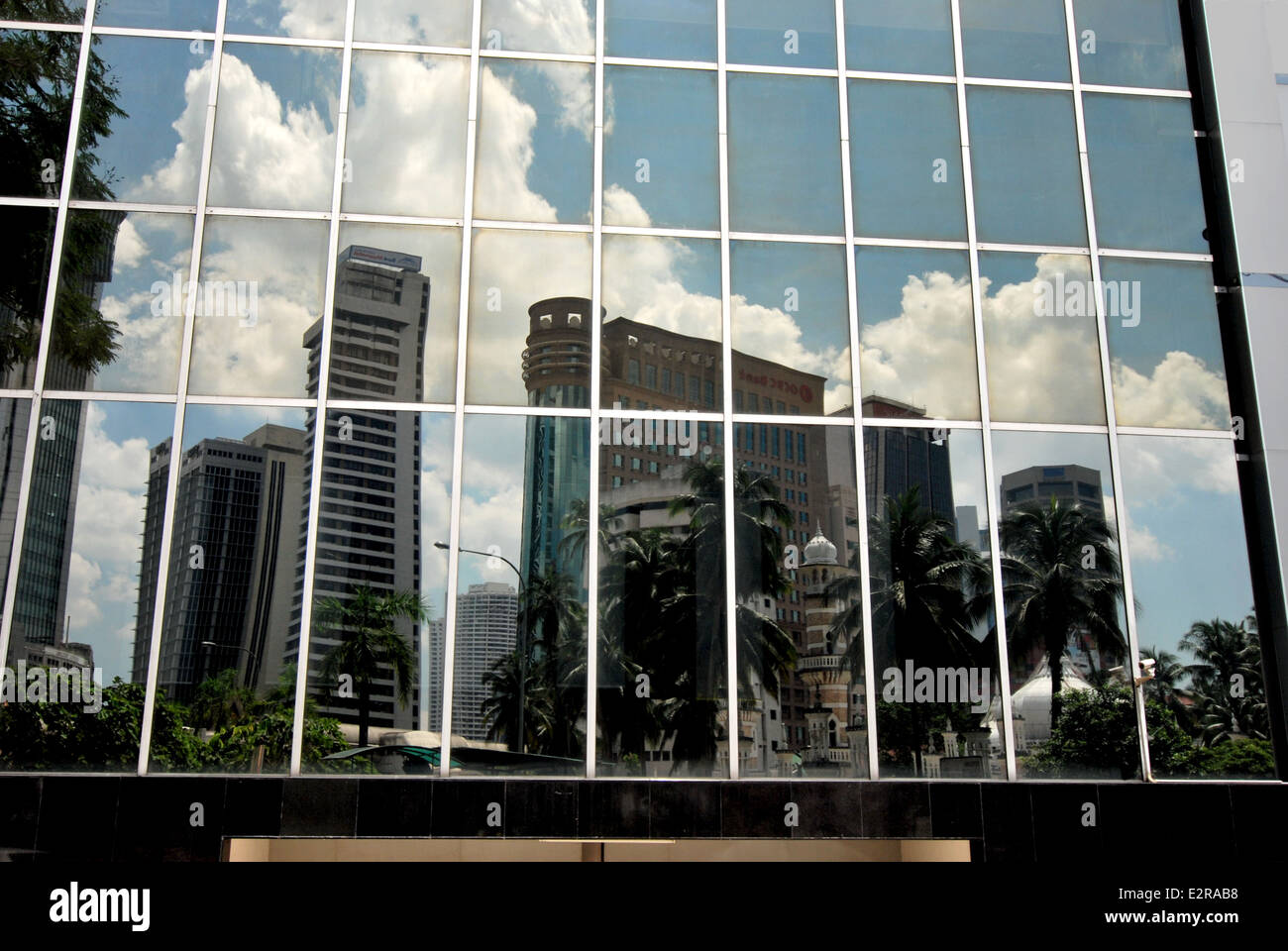 Reflections of buildings on glass window panes Stock Photo - Alamy