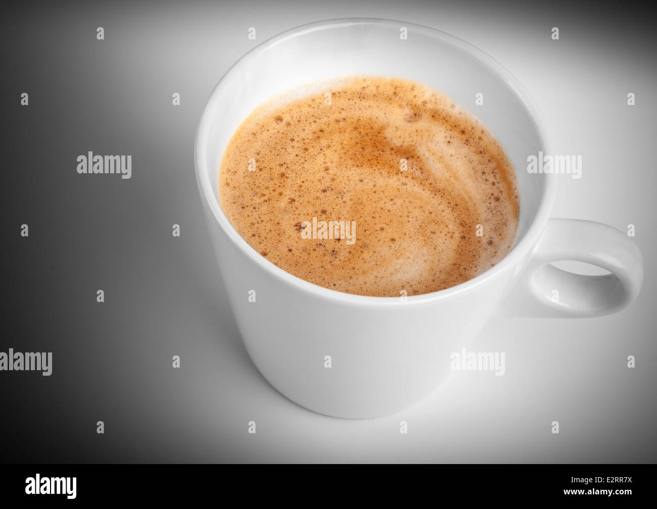 Cup of espresso coffee on gray background Stock Photo - Alamy