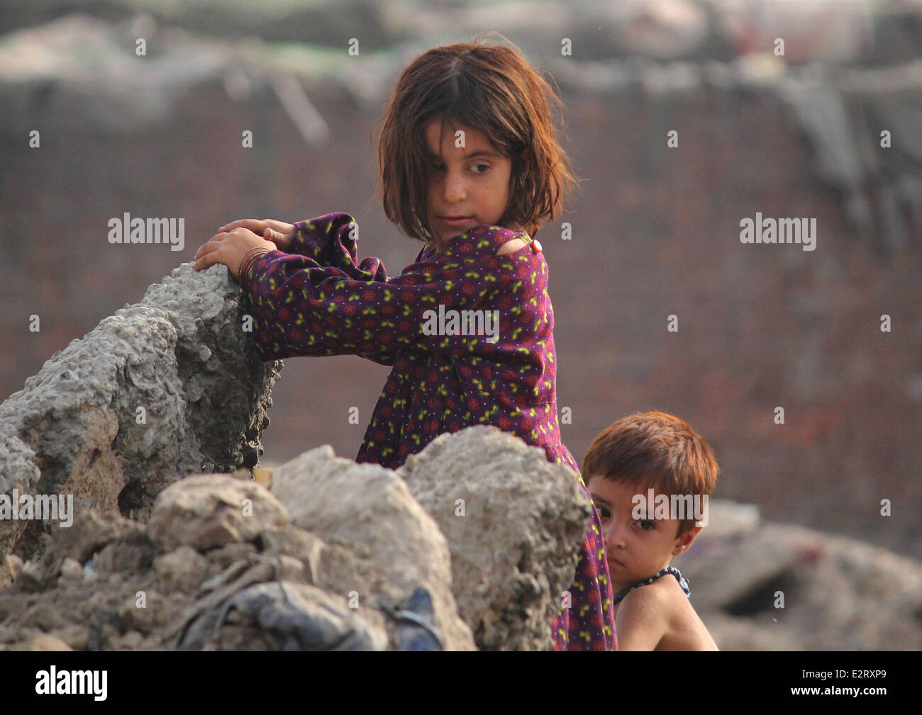 The children of Afghan refugee playing near their refugee camp on the ...