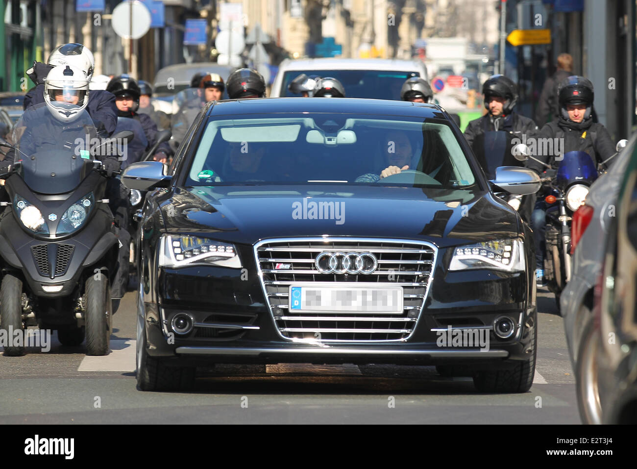 David Beckham seen driving around Paris in his Audi S8 car surrounded ...