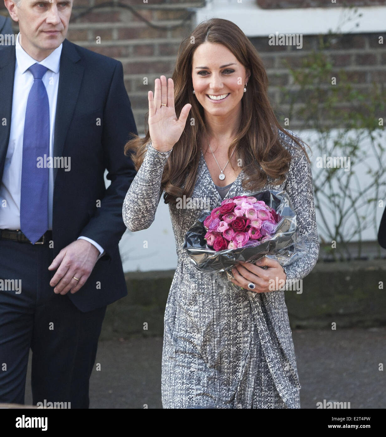 Catherine, Duchess of Cambridge leaves Hope House carrying a bouquet of ...