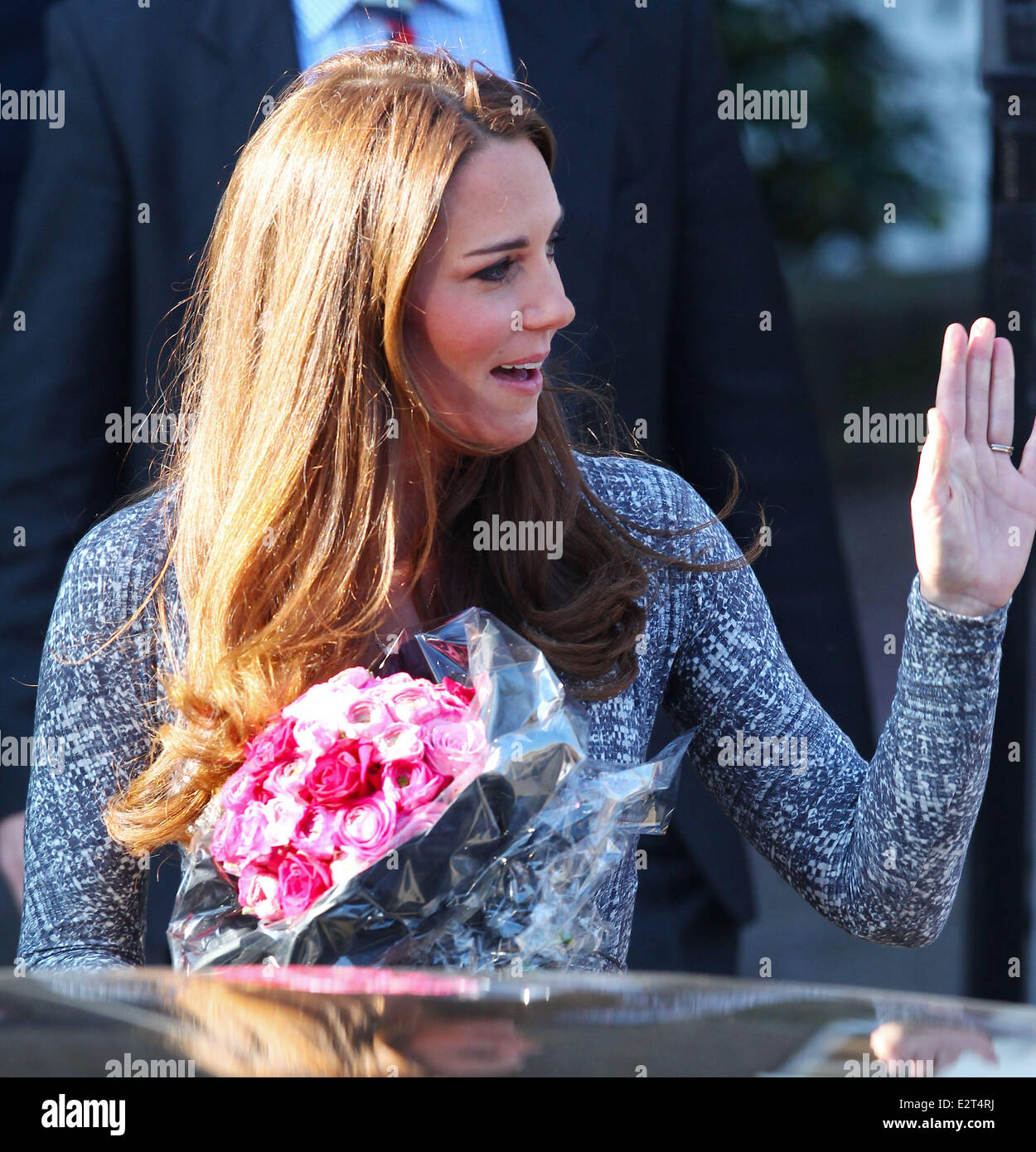 Catherine, Duchess of Cambridge leaves Hope House carrying a bouquet of ...