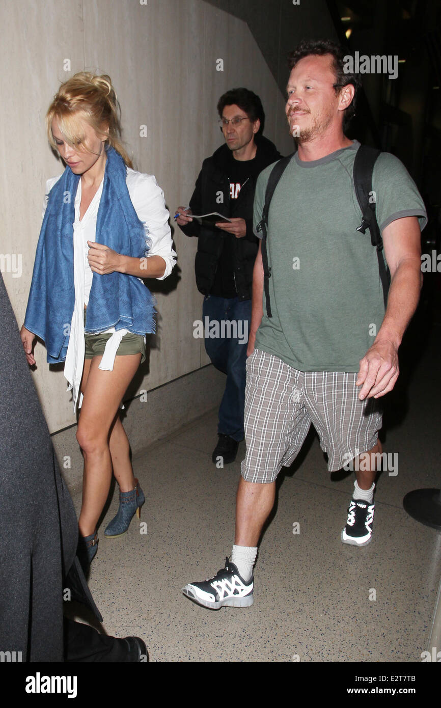 Pamela Anderson and hew new boyfriend Jesus Villa arrive at Los Angeles ...