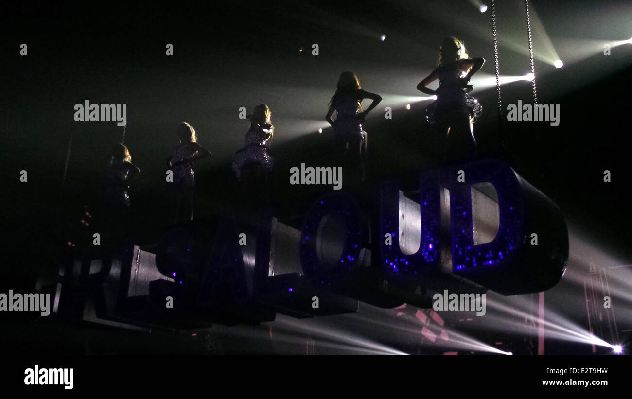 Girls Aloud performing live in concert on the opening night of their ...