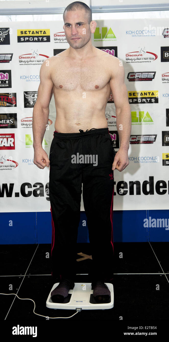 Fighters attend the weigh-in for 'Cage Contender' due to take place at ...