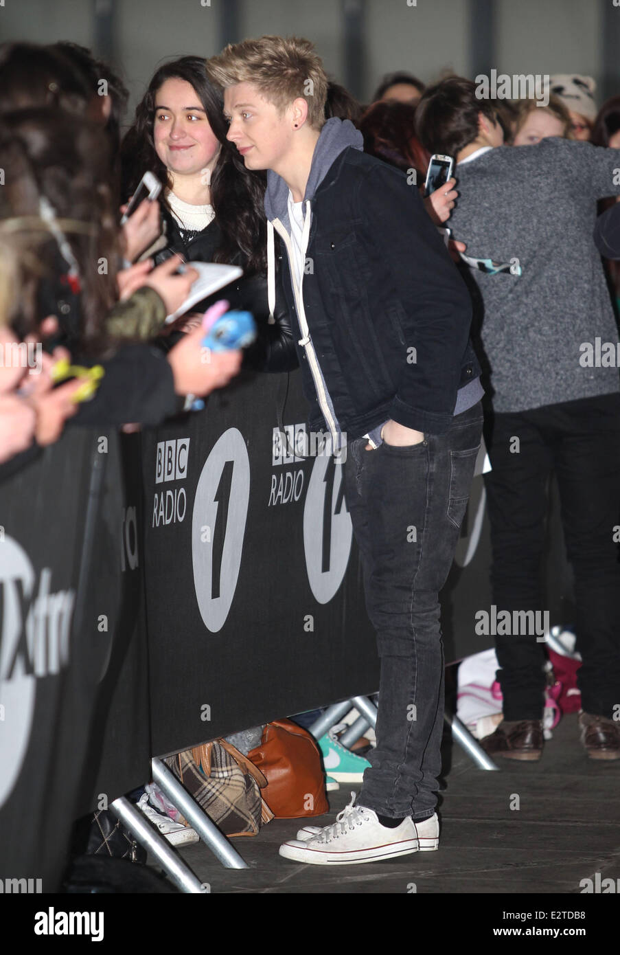 District3 are met by large groups of fans as they visit the BBC Radio 1 ...