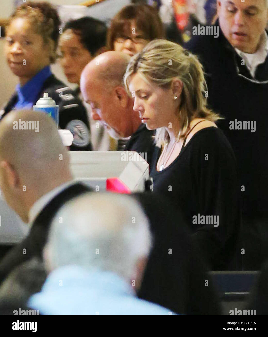 Billy Joel and his wife Alexis Roderick passes through airport security ...