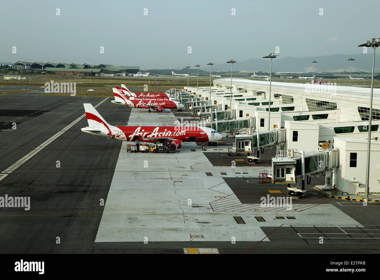 Air Asia jet aircraft parked outside the new KLIA2 terminal buildings ...