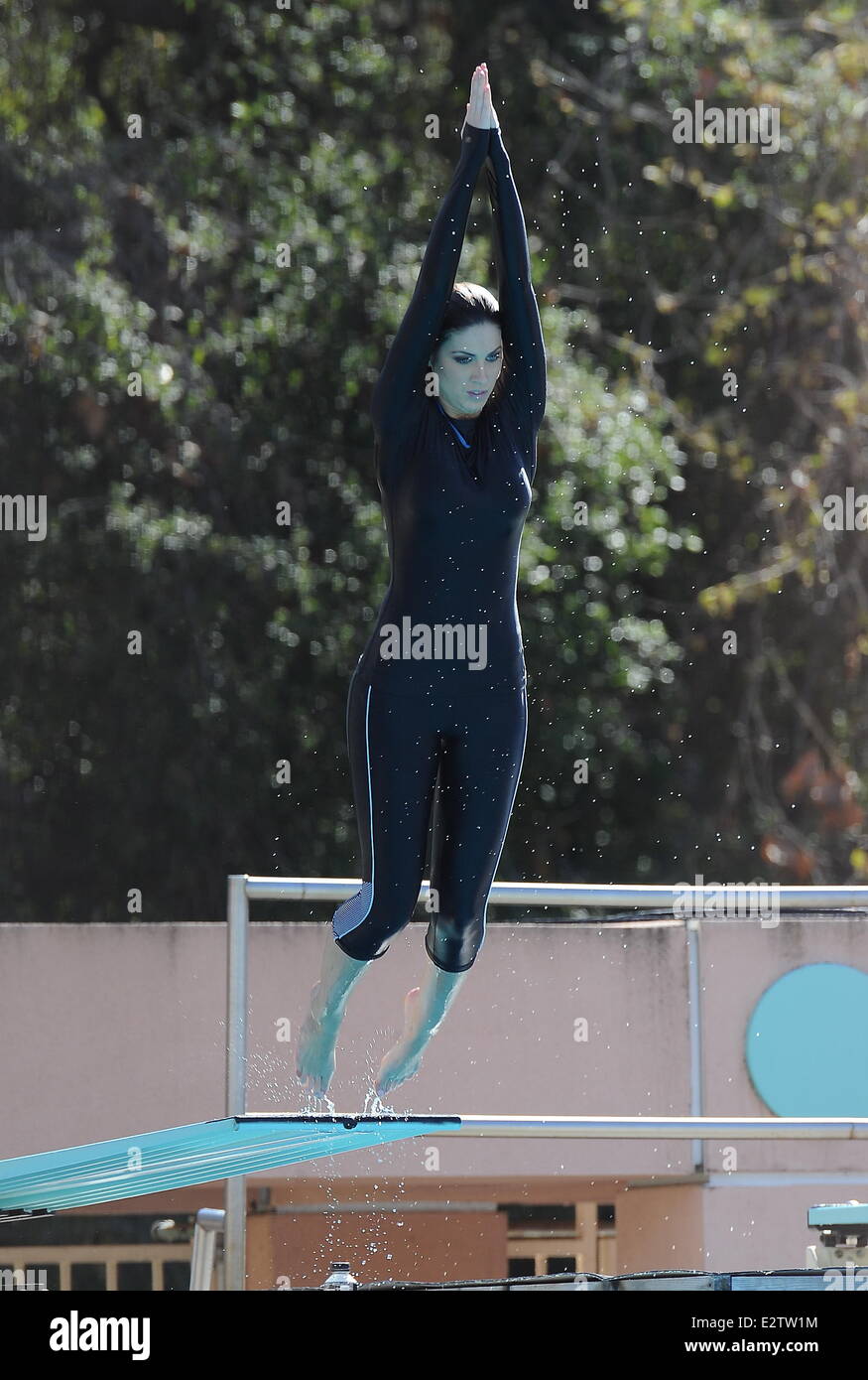 Katherine Webb seen stretching out before practicing her diving ...