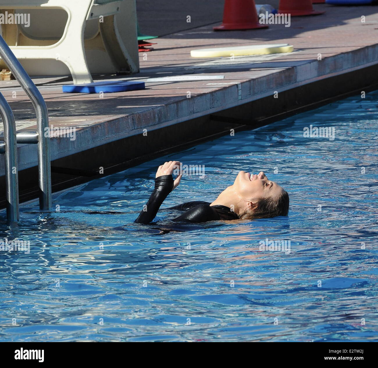 Katherine Webb seen stretching out before practicing her diving ...