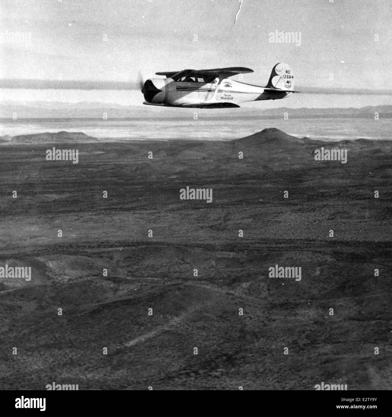 The Beechcraft B17L Staggerwing (NC12584) flying over Arizona on ...