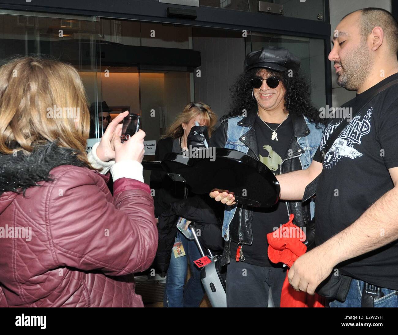 Guitarist Slash is seen greeting fans outside the Morrison Hotel in ...