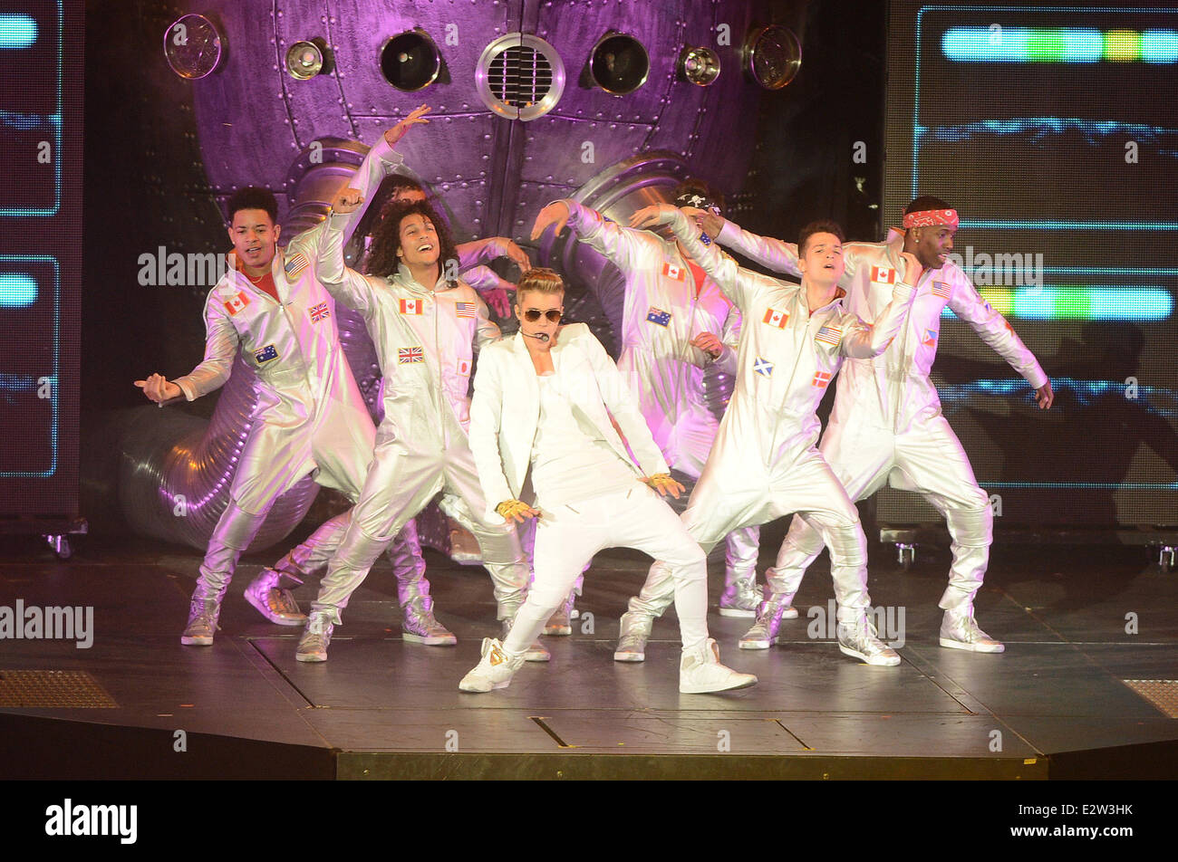 Justin Bieber performing live on stage his 'All Around The World' tour ...