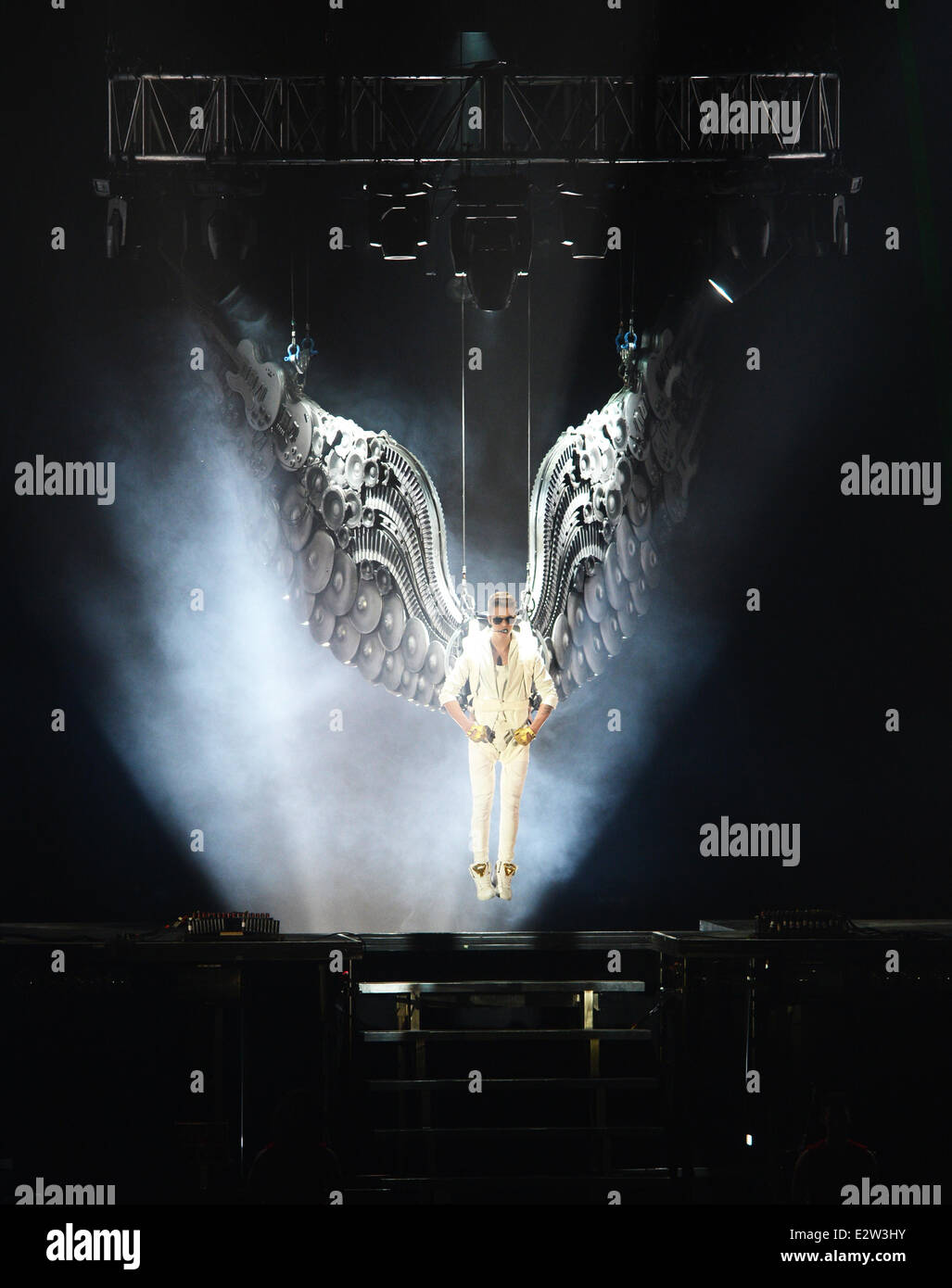 Justin Bieber performing live on stage his 'All Around The World' tour ...