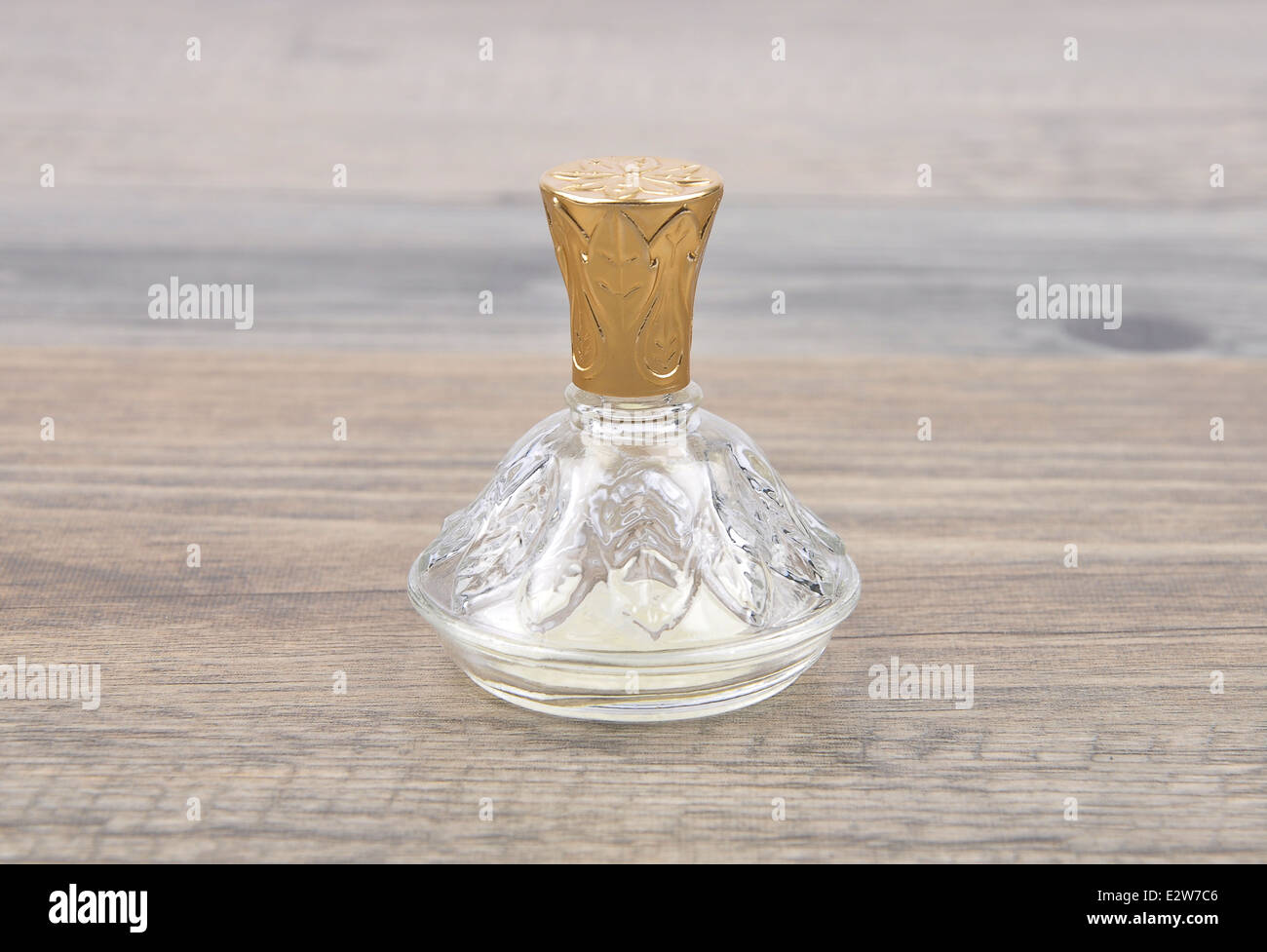 Flacon on wood Stock Photo - Alamy