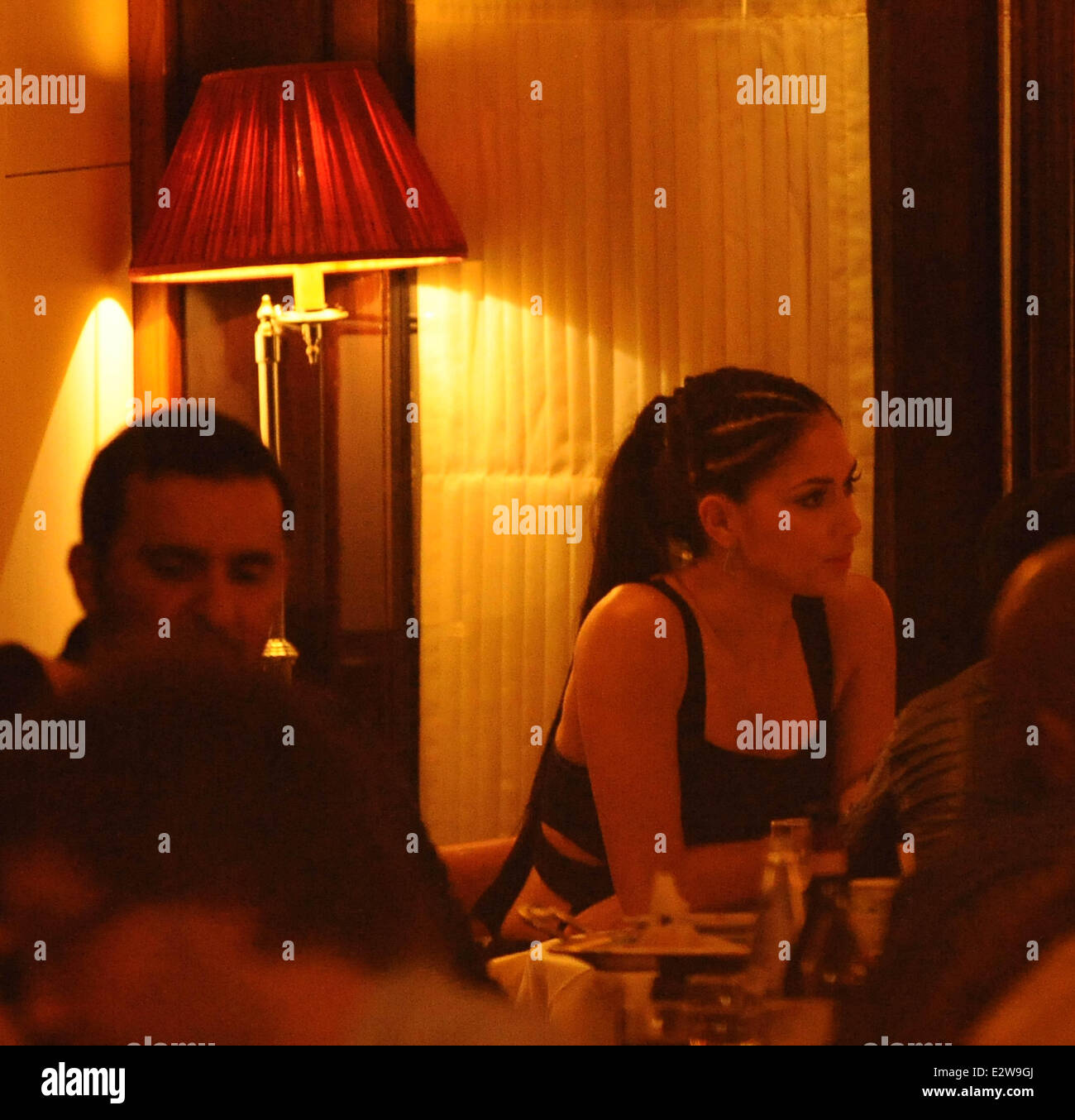 Nicole Scherzinger dining late at a table inside C London restaurant ...