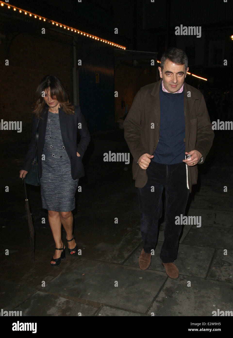 Rowan Atkinson arriving at J Sheekey for dinner with his wife Sunetra ...