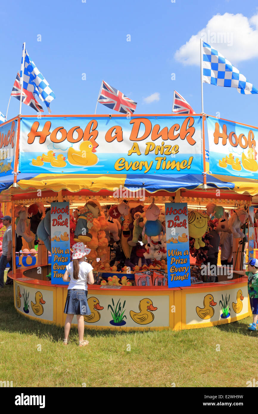 Wimbledon Common, London SW19 UK. 21st June 2014. Girl playing the Hook ...