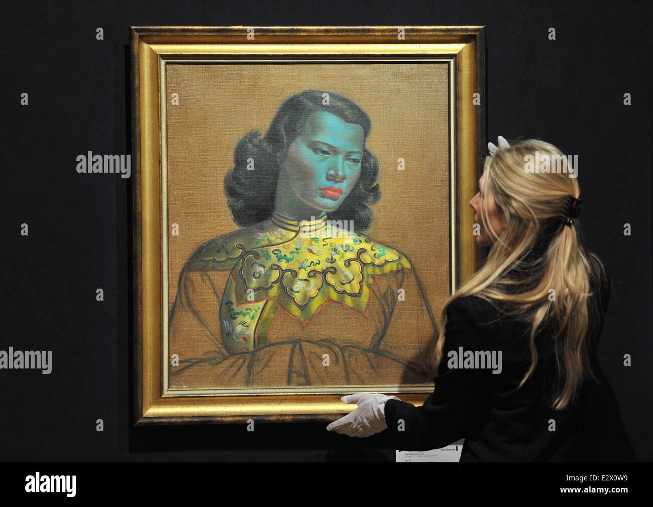 Vladimir Tretchikoff's 'Chinese Girl' hangs on display at Bonhams ...