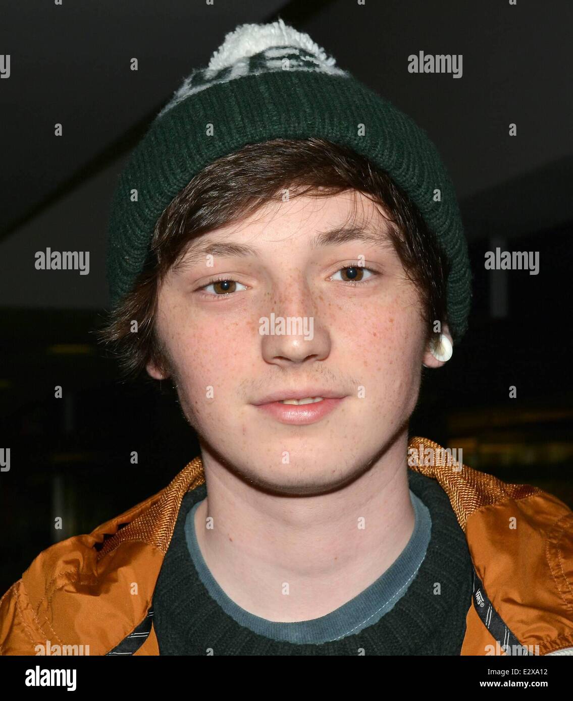 Oxford singer Lewis Watson arrives at Dublin Airport carrying his ...