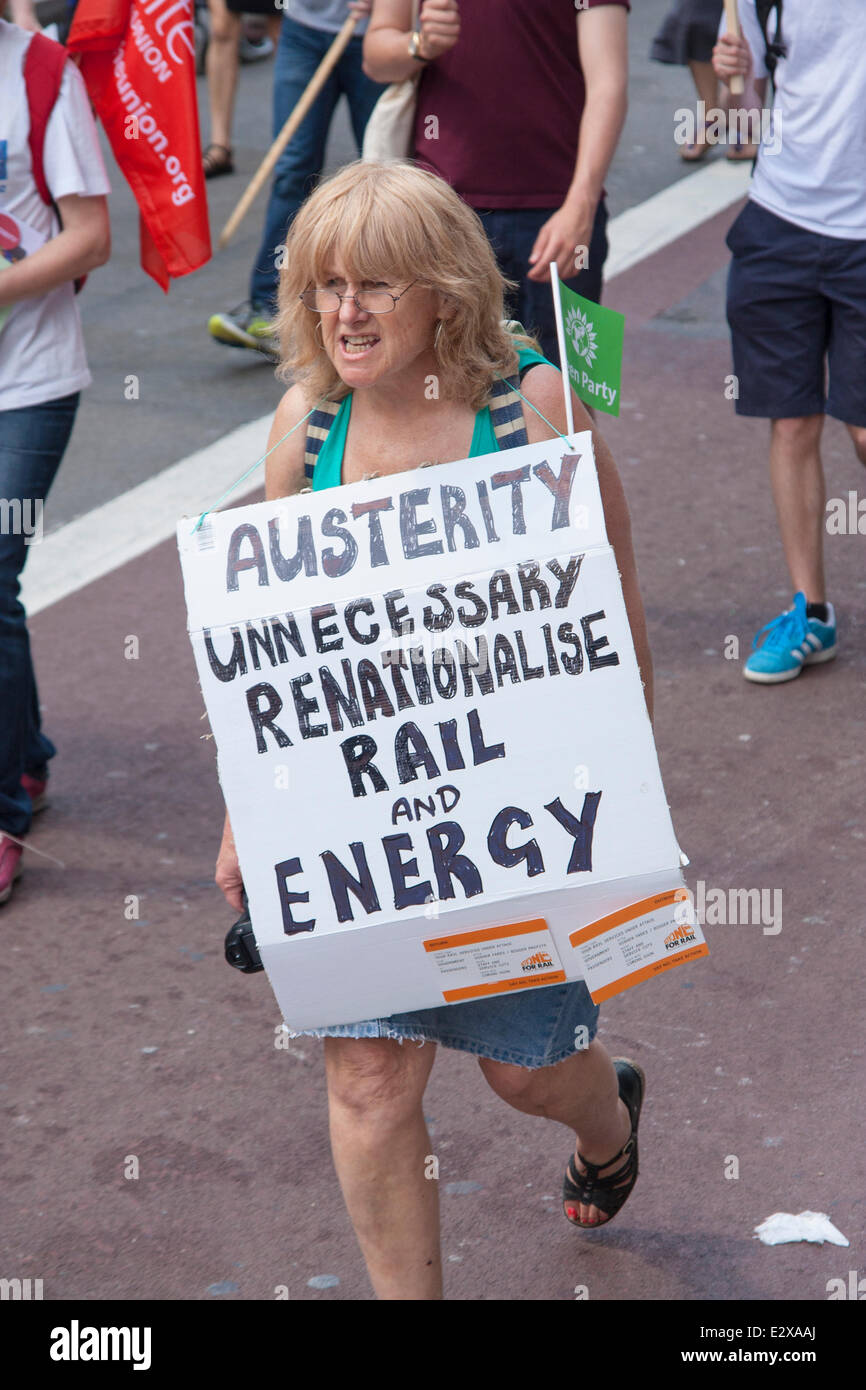 London, June 21st 2014. A woman demands the renationalisation of the ...