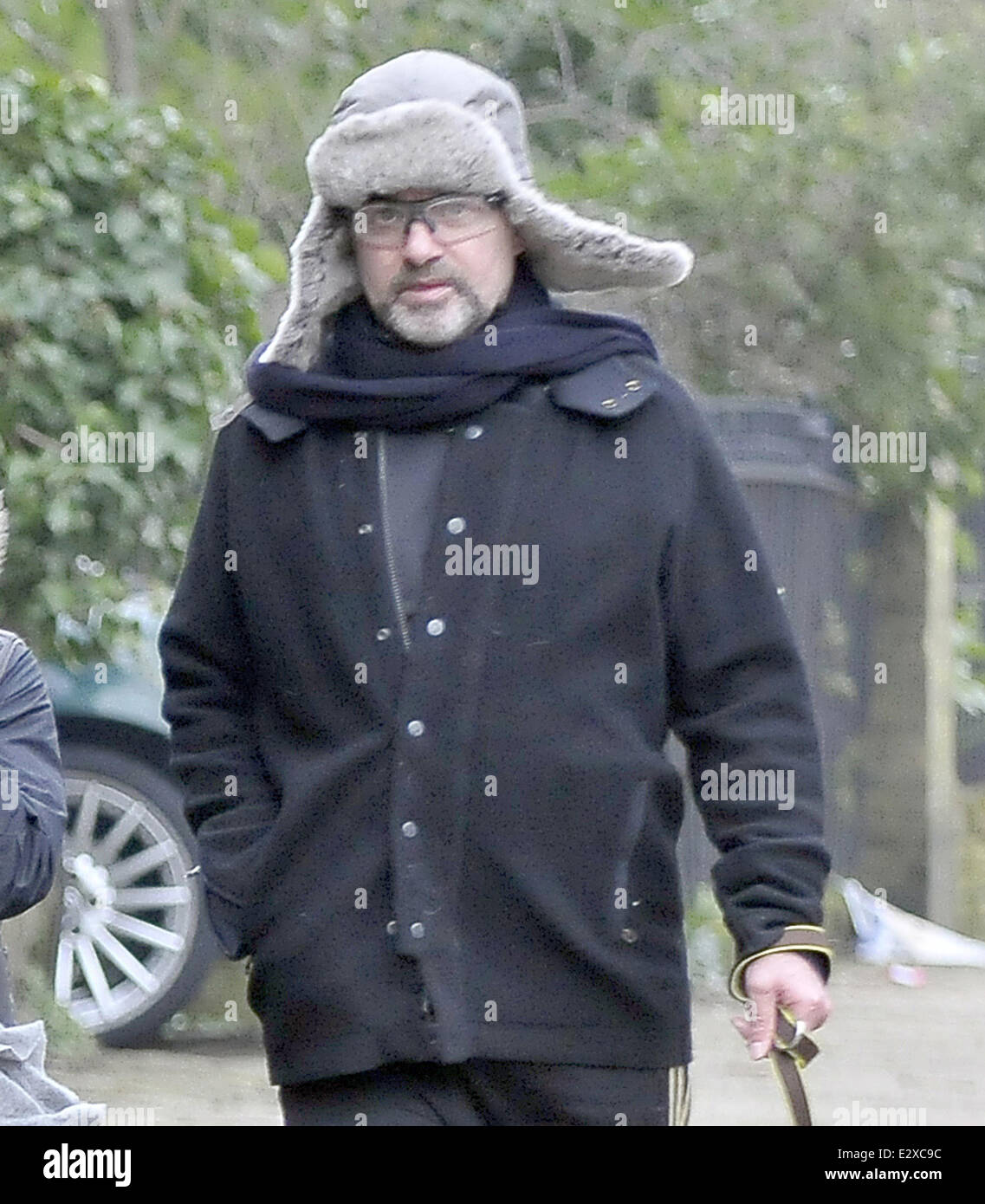 George Michael spotted out walking his dog with his friends in London ...