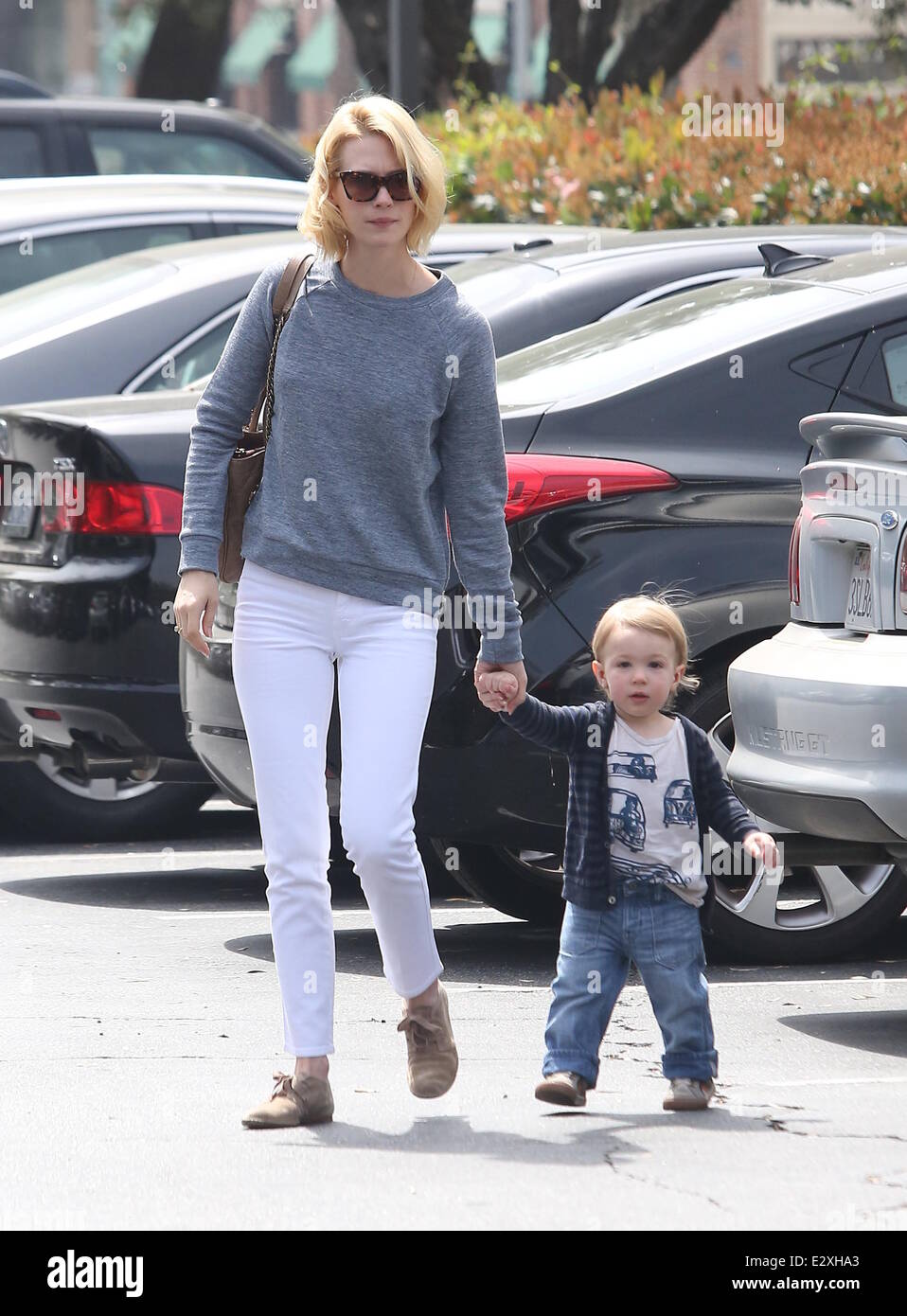 January Jones seen with her son Xander and a friend heading to Houston ...