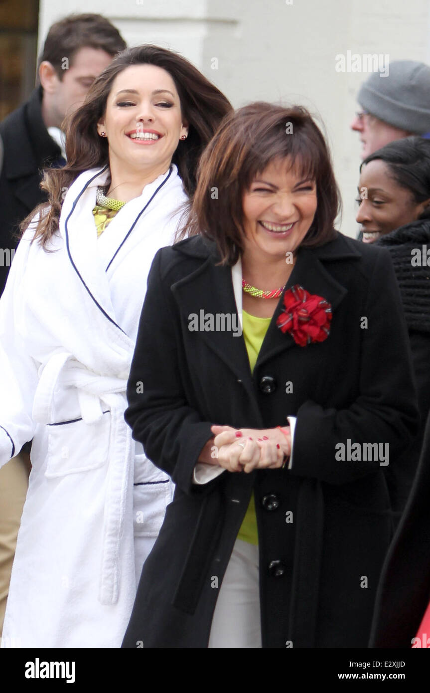 Kelly Brook and Lorraine Kelly film an advert for ITV in a busy London ...
