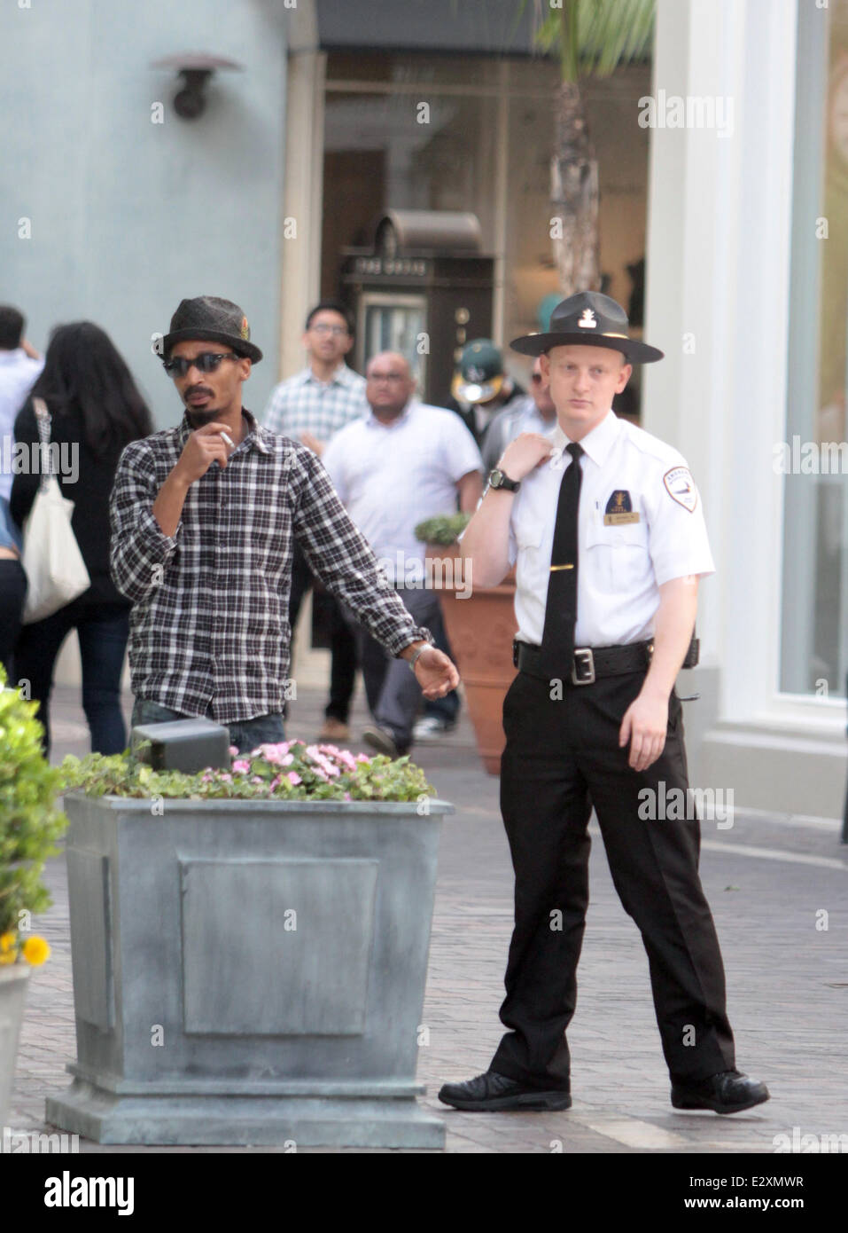 Eddie Steeples is confronted by a security guard for smoking at The ...