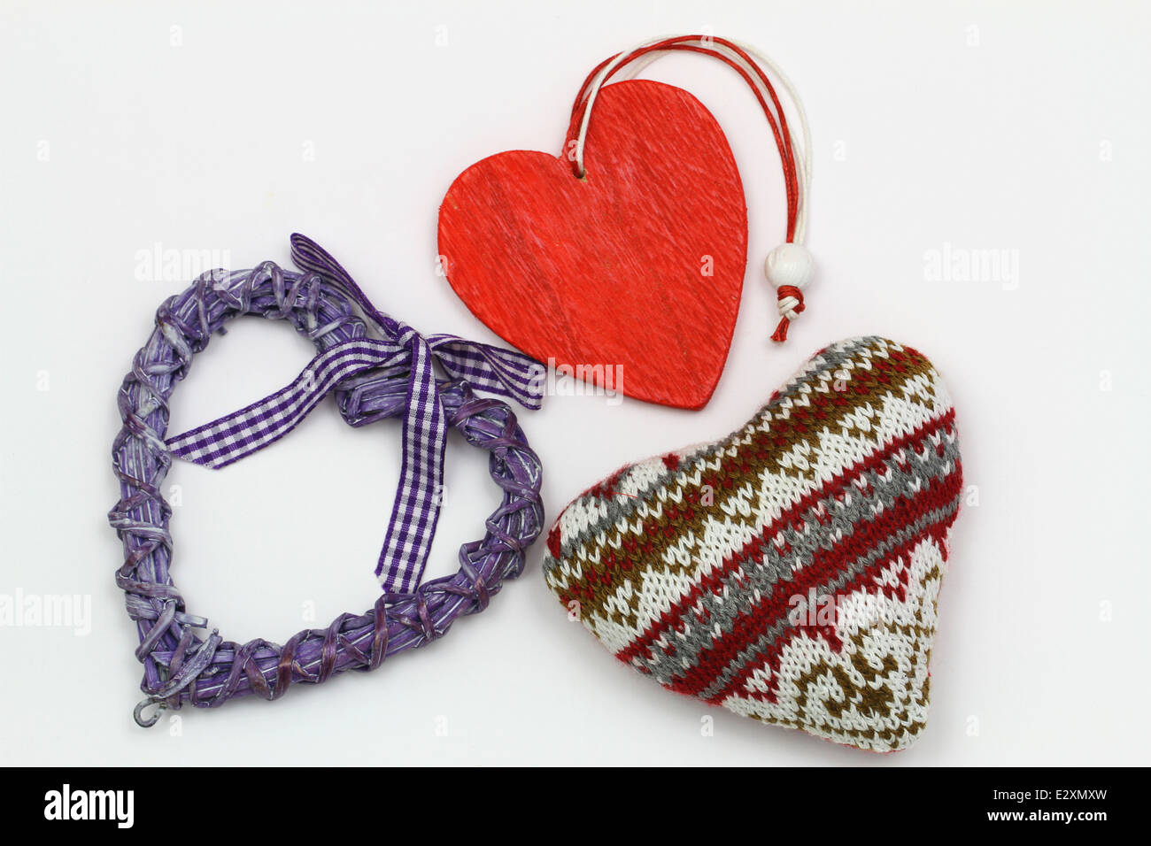 Selection of colorful hearts on white surface Stock Photo - Alamy