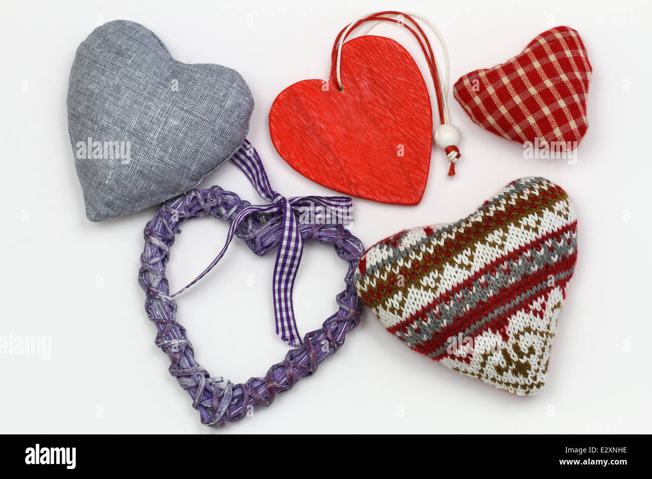 Selection of hearts on white surface Stock Photo - Alamy