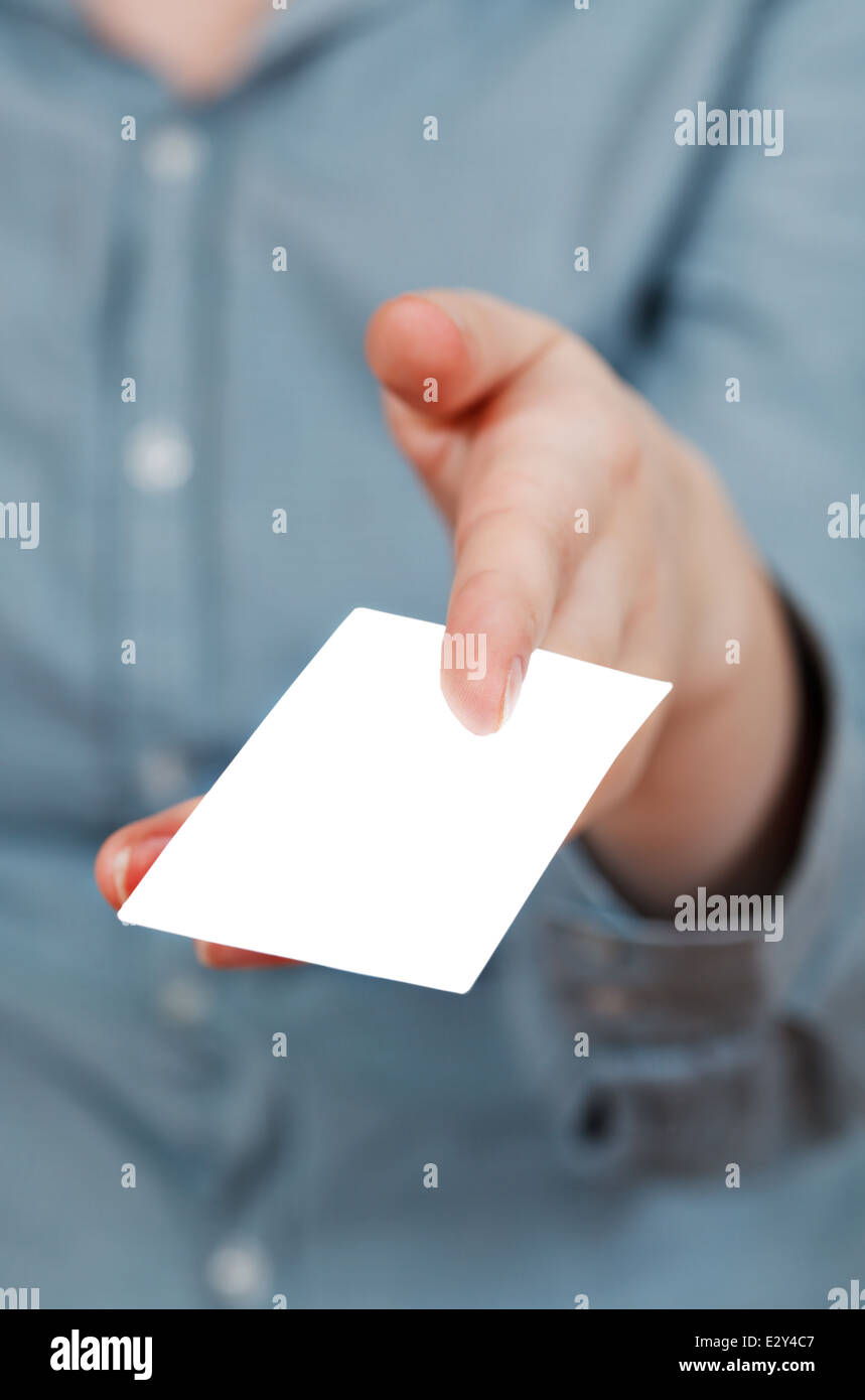 blank business card in between fingers close up Stock Photo - Alamy