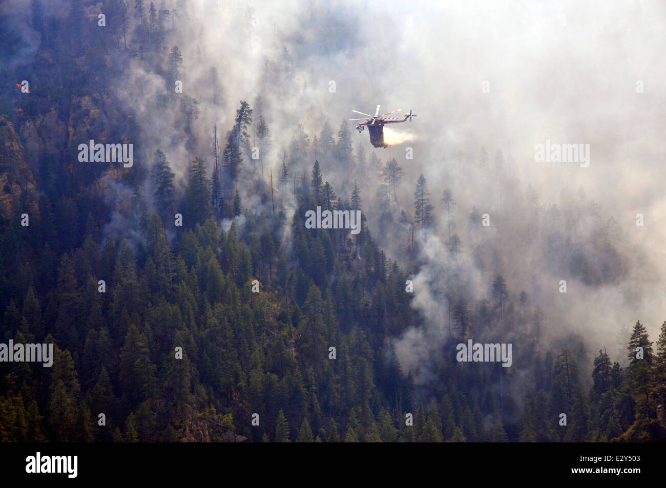 During the Slide Fire in Oak Creek Canyon, a heli-drop operation is ...