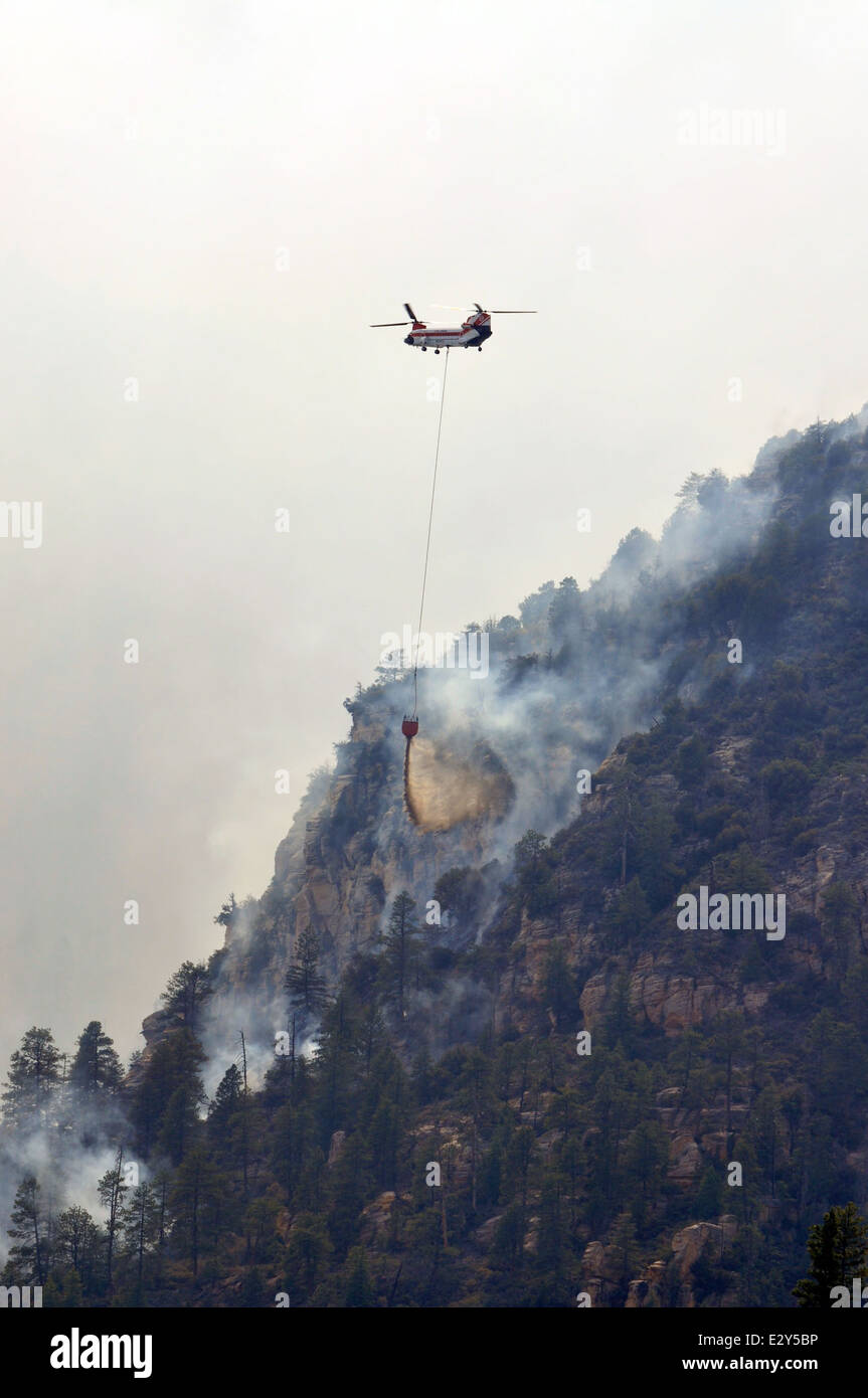Helicopter drops are used during the Slide Fire in Oak Creek Canyon to ...