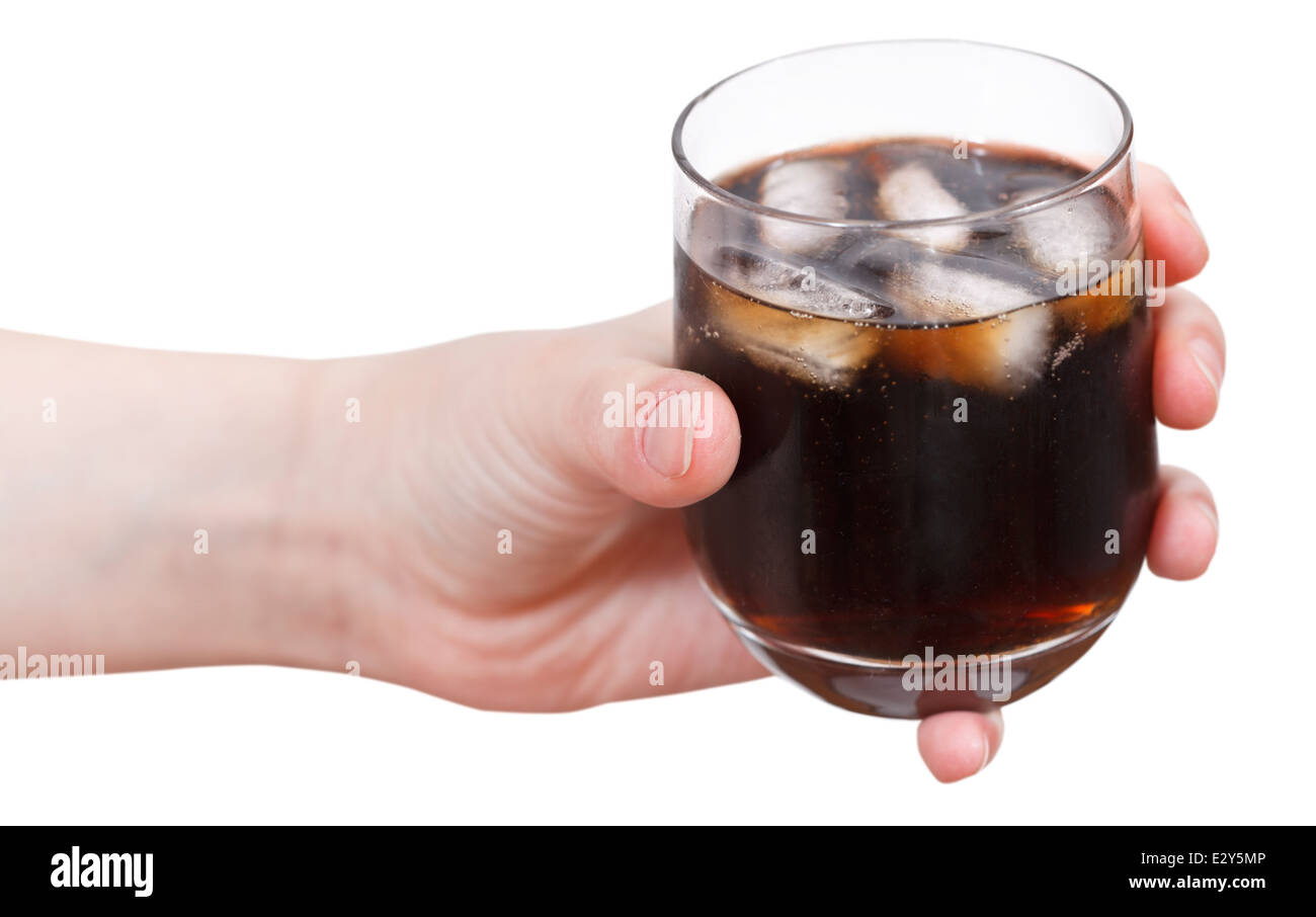 hand holds cola with ice in glass isolated on white background Stock ...