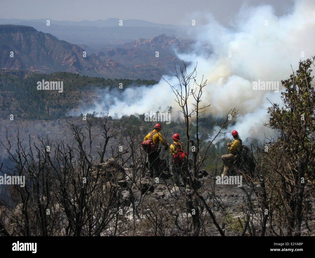Firefighters take a brief respite during the Taylor Fire in the ...
