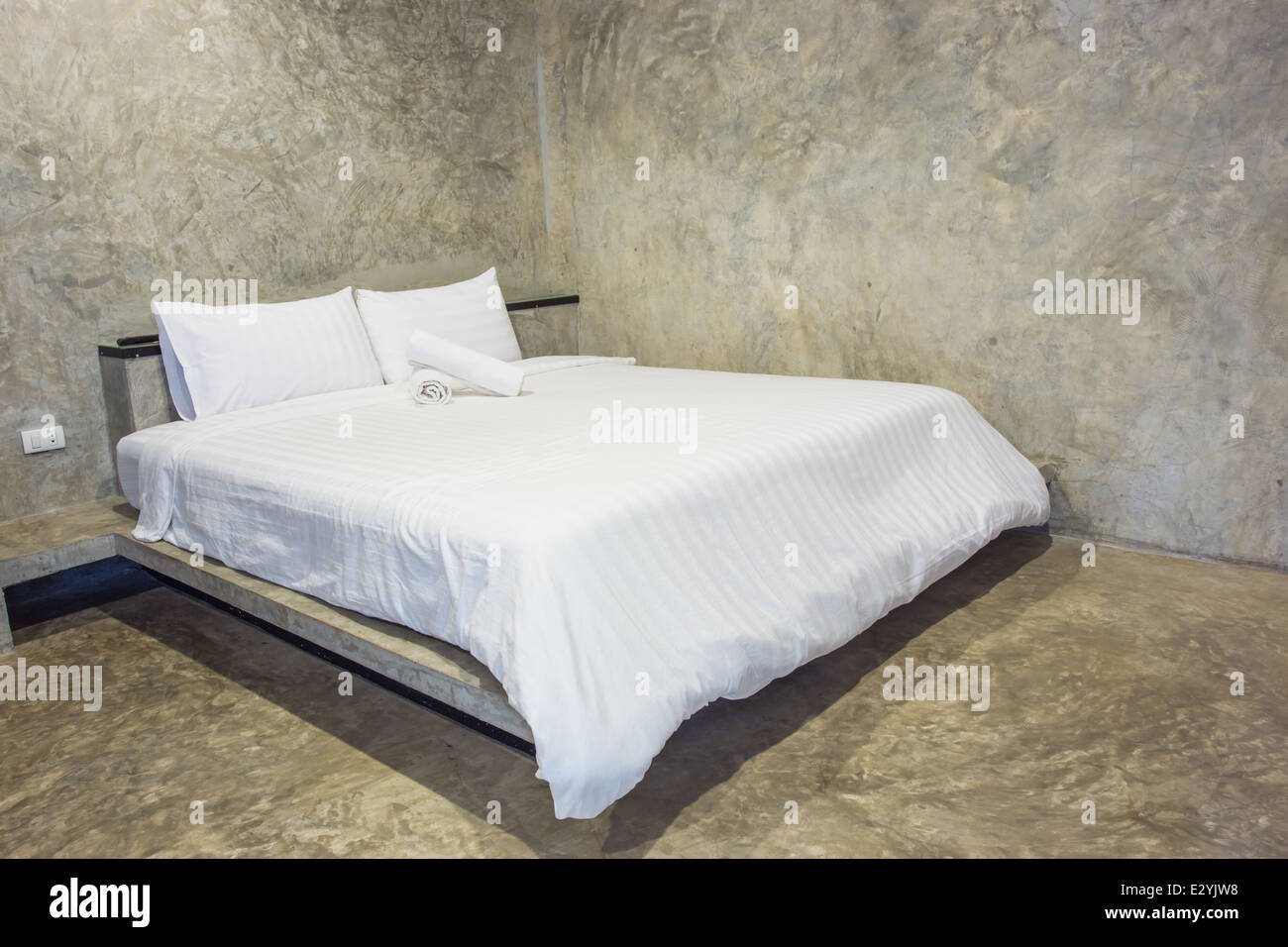 white bed with gray cement texture of Grunge Concrete wall Stock Photo ...